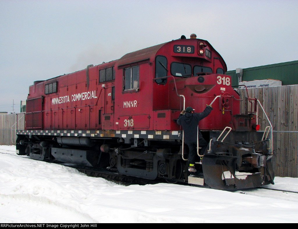 110105016 MNNR 318 Rolls Past Amtrak Midway Station